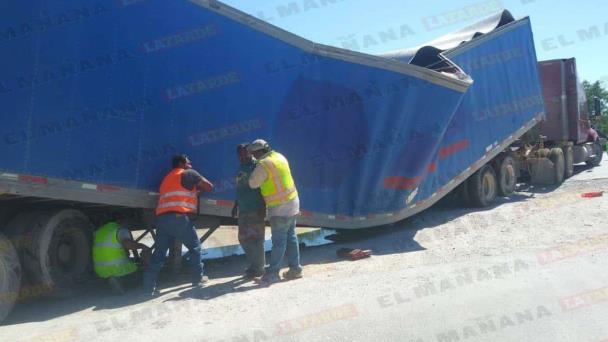 Vence pesada carga la caja de un trailer